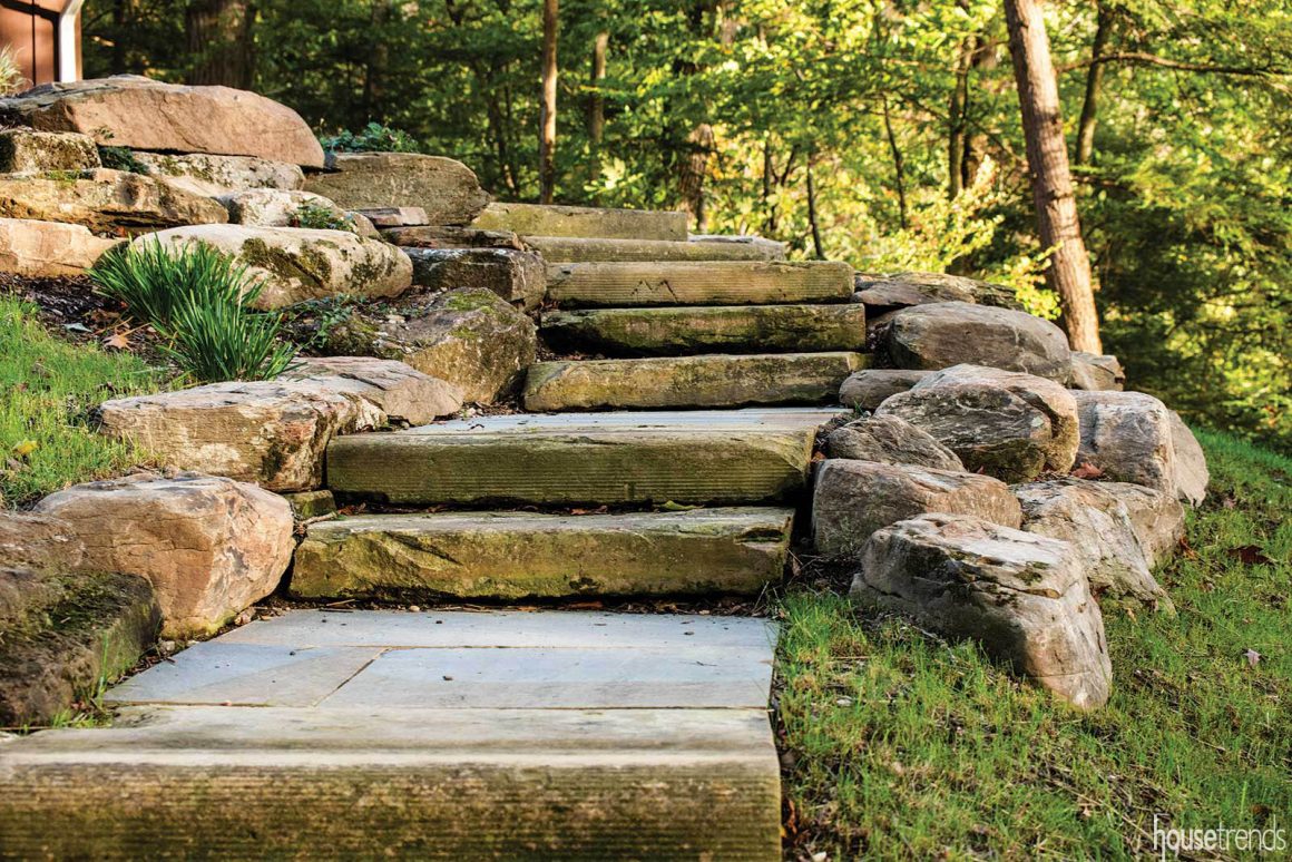 Boulders anchor a home with a view between a rock and a beautiful place